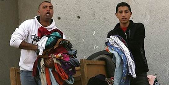 Strapped Gazans buy Israeli cast-off clothes - World - DAWN.COM