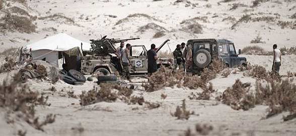 US, EU up pressure on Libya as new fighting hits Brega - World - DAWN.COM