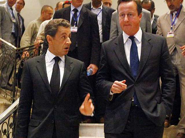 Sarkozy, Cameron hailed in Libya, forces enter Sirte - DAWN.COM