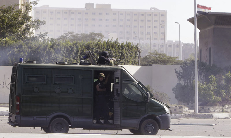 Egypt policemen to be arrested for killing Islamists - World - DAWN.COM
