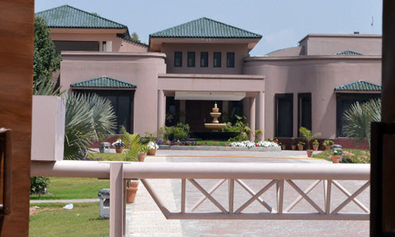 Bomb-proof wall under construction outside Musharraf's farmhouse ...