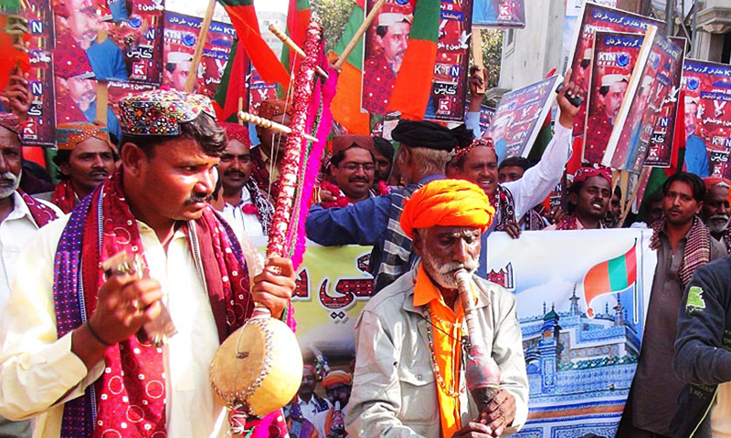 Sindh brings out its colours on 'Ajrak-Topi' day - Pakistan - DAWN.COM