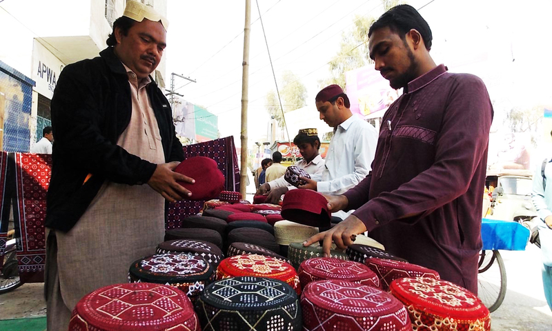 Sindh brings out its colours on 'Ajrak-Topi' day - Pakistan - DAWN.COM