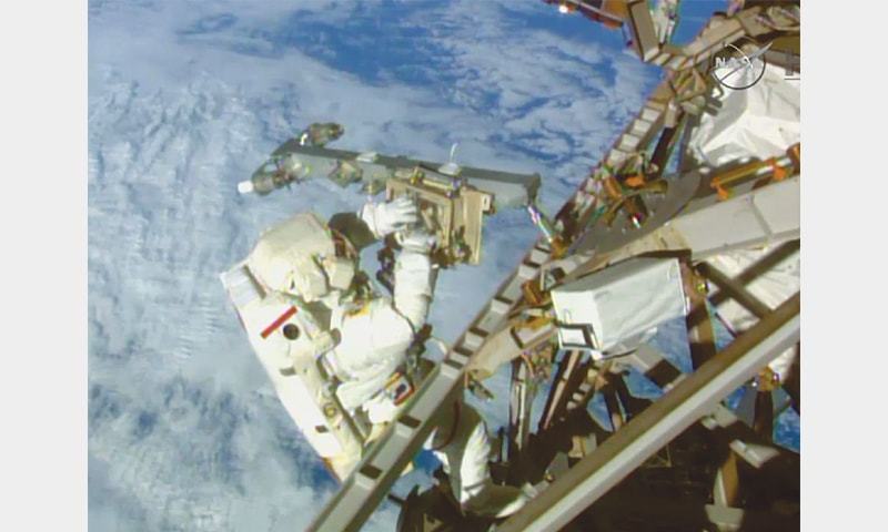 Spacewalking astronauts finish extensive, tricky cable job - World ...