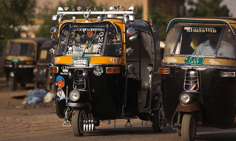Sudan's hot-rod rickshaw men splash cash to win fares - World - DAWN.COM