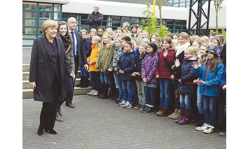 Merkel visits school which lost 16 students in plane crash - World ...