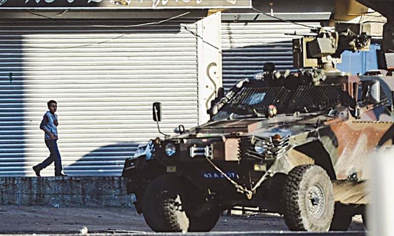 Trapped in war zone, locals struggle in Turkey curfew towns - World ...