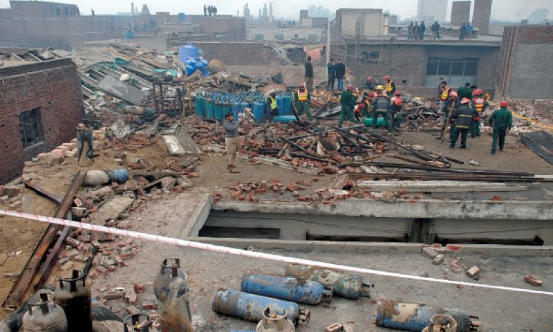 Cylinder blasts at two places 10 battle for breath after factory roof ...