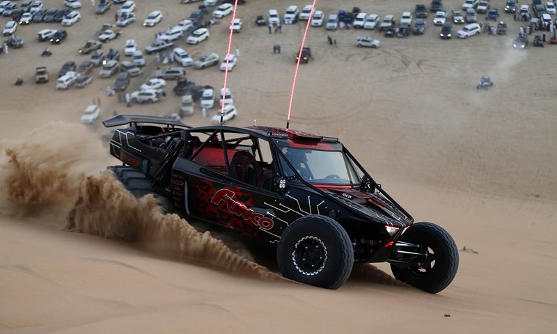 Blazing across dunes: Emiratis gather for drag racing festival ...