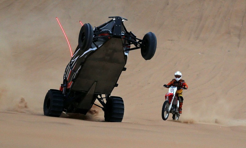 Blazing across dunes: Emiratis gather for drag racing festival ...