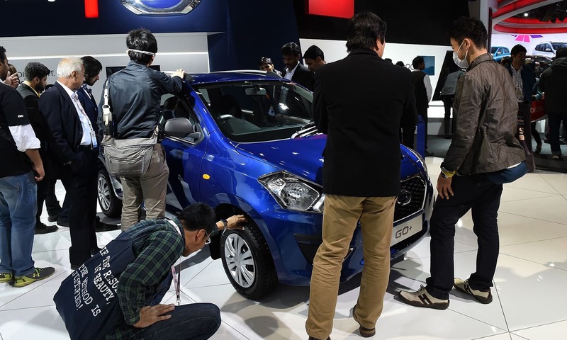 Indian auto show exhibits SUVs, super bikes alongside cricket stars ...