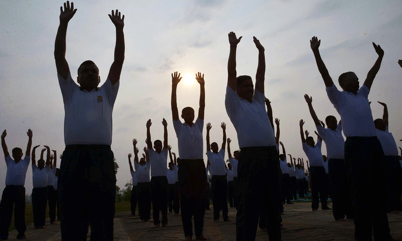 Millions stretch and bend as Indian PM Modi leads International Yoga ...