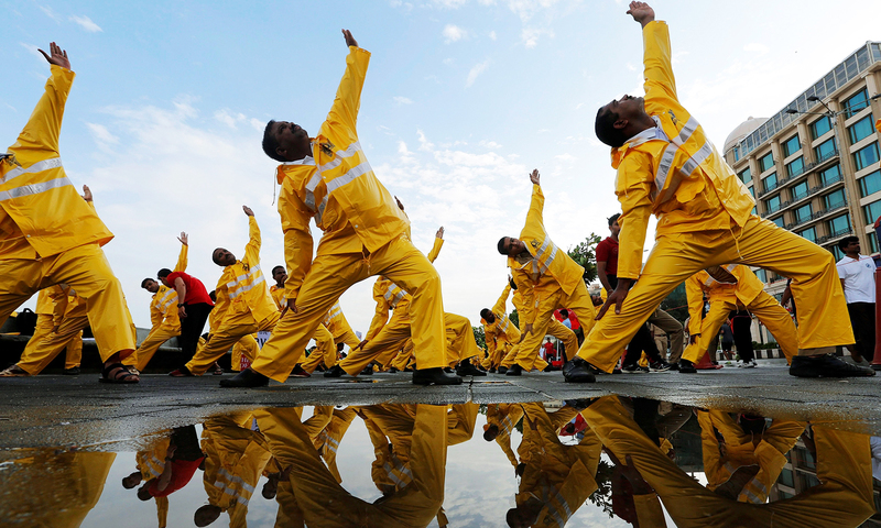 Millions stretch and bend as Indian PM Modi leads International Yoga ...