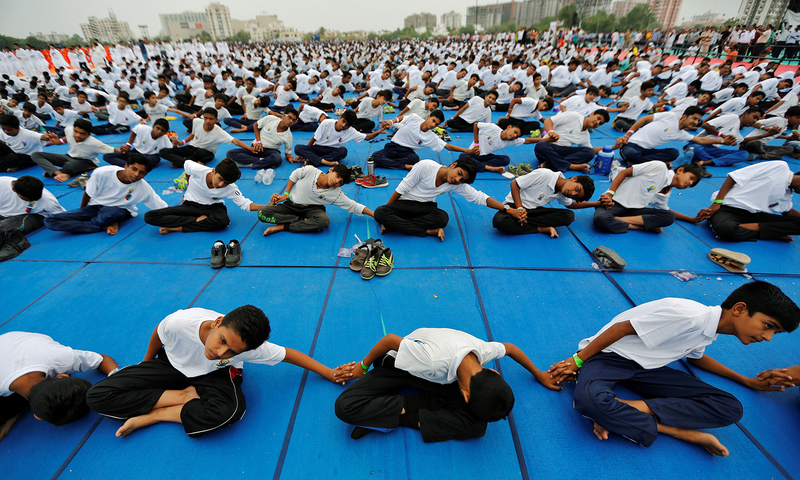 Millions stretch and bend as Indian PM Modi leads International Yoga ...