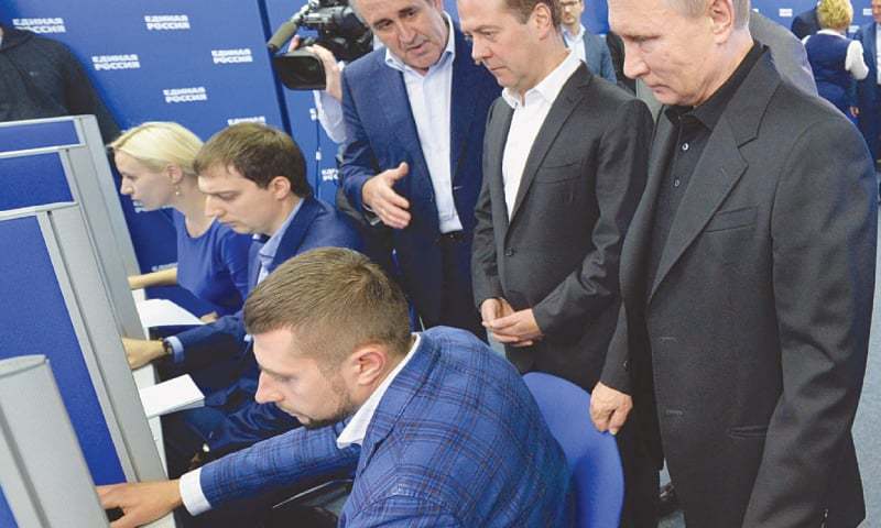 Putin cheers resounding win in Russia parliament vote - Newspaper ...