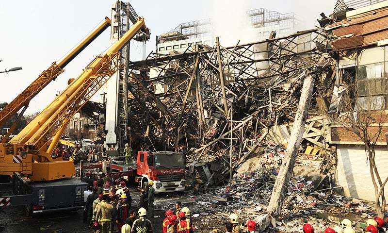 Collapse of burning Tehran high-rise kills 30 firefighters - World ...
