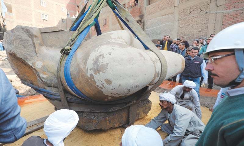 Second part of ancient Egyptian statue lifted from site - World - DAWN.COM