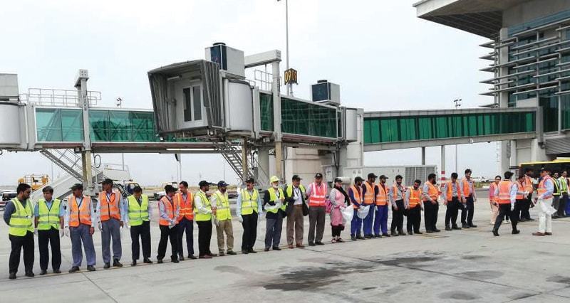 CAA, Airport Services staff hold awareness walk at IIA - Newspaper ...