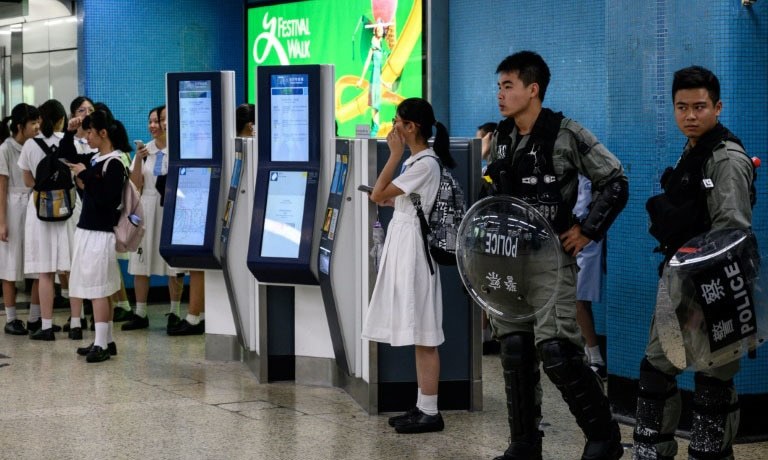 Hong Kong protesters call student boycott, strike after weekend of ...