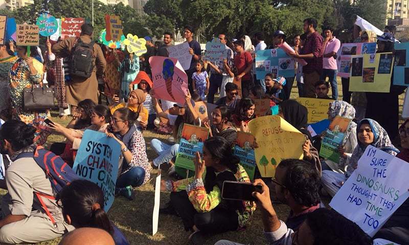 Pakistanis answer call to march against climate change in vast global ...