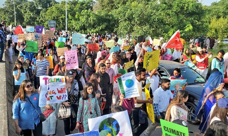 Pakistanis answer call to march against climate change in vast global ...