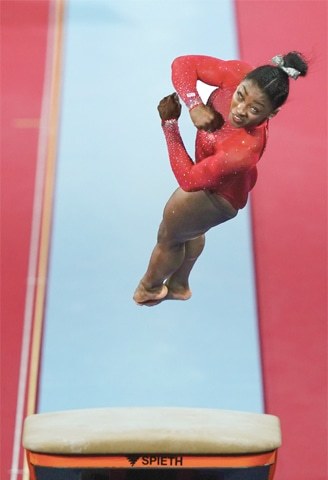 Biles on verge of history after record-equalling 23rd world medal ...