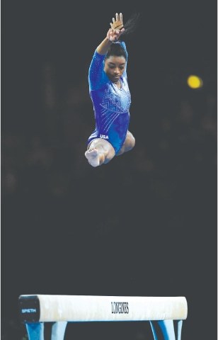 Biles sets all-time medal record at gymnastics worlds - Newspaper ...