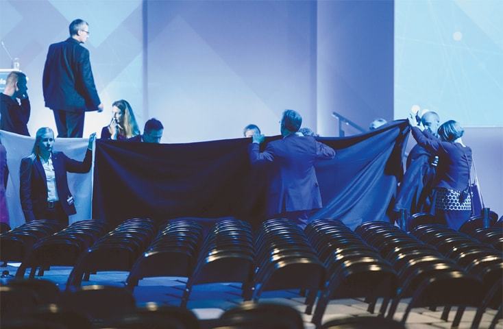 German economy minister falls while leaving stage at IT event ...