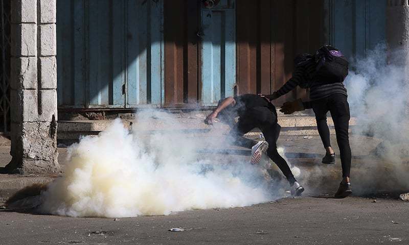 Iraqi protesters cut roads, retake third strategic bridge - World ...