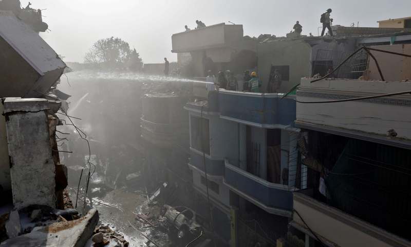 In pictures: PIA flight PK-8303 crashes in Karachi's Model Colony ...