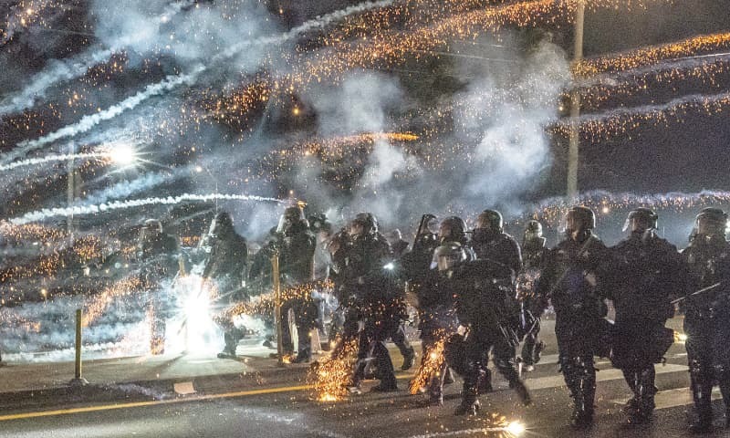 Tear gas, fire bombs as police declare Portland protest a ‘riot ...