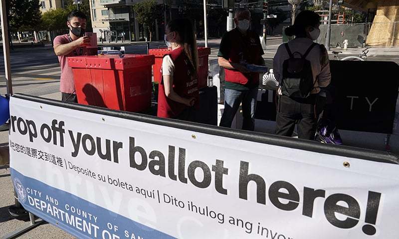 Huge turnout as Americans vote in a tense US presidential election - US ...
