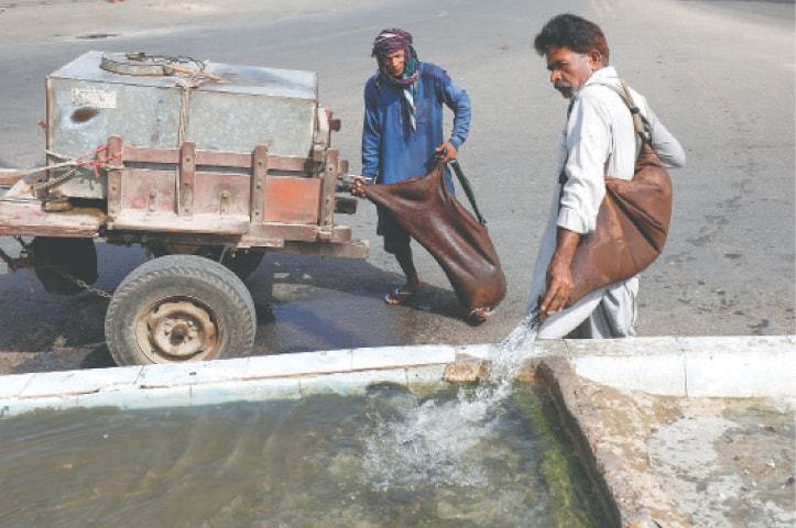 Karachi's water bearers quench thirst in Ramazan, but fear for their ...