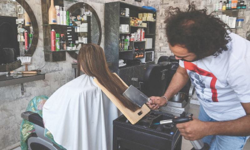 With cleavers & blowtorches, barber offers hair-raising cuts ...