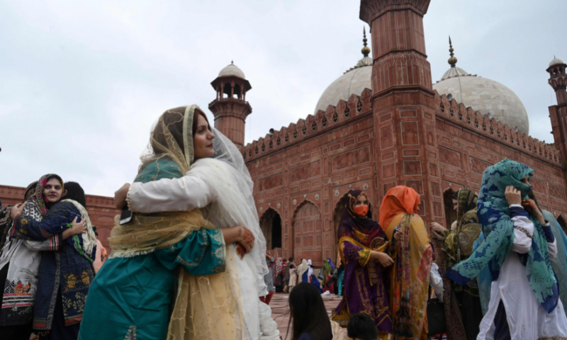 In pictures: Masks and distanced prayers as Muslims in Pakistan and ...