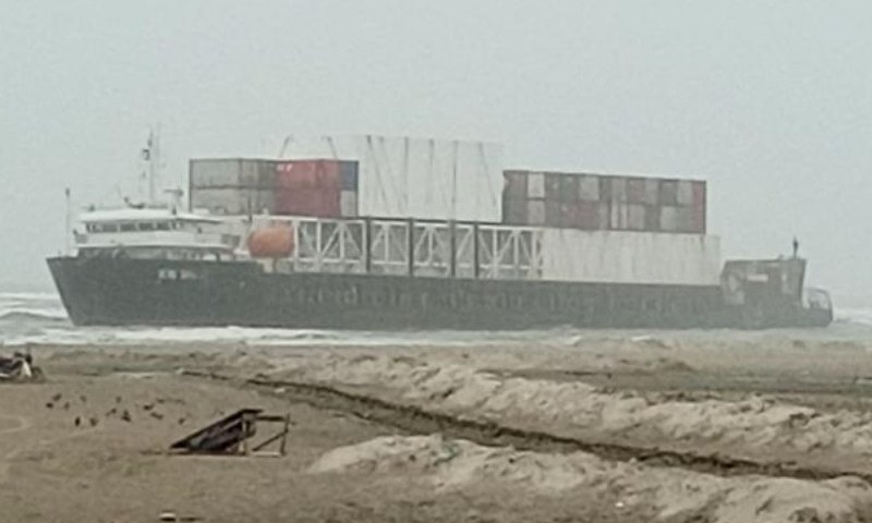 Cargo ship beached at Karachi's Sea View after losing anchors due to ...