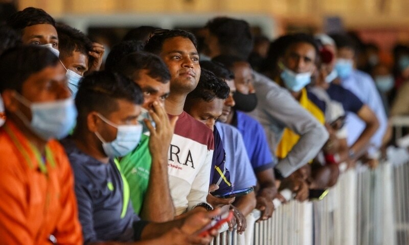 Qatar’s migrant army queues for glimpse of World Cup - Sport - DAWN.COM