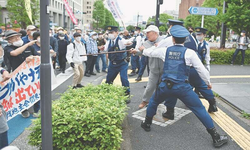 Okinawa marks 50 years since US handover with calls for fewer bases ...