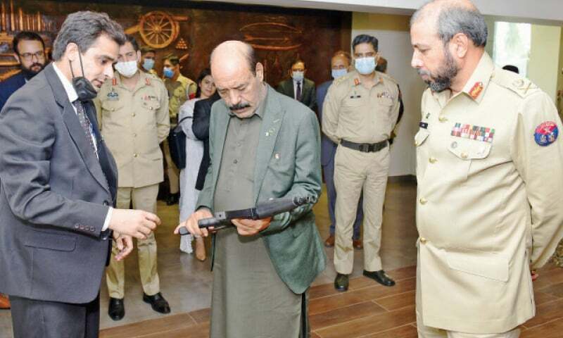 Minister impressed with quality of POF weapons - Newspaper - DAWN.COM