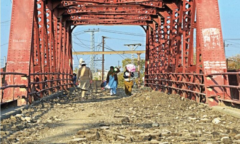 Repair of damaged bridge over railway track begins - Newspaper - DAWN.COM