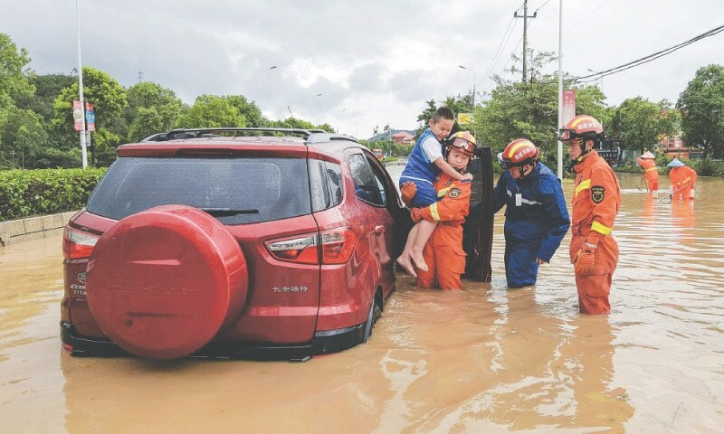 Nearly half a million evacuated as typhoon batters China - World - DAWN.COM