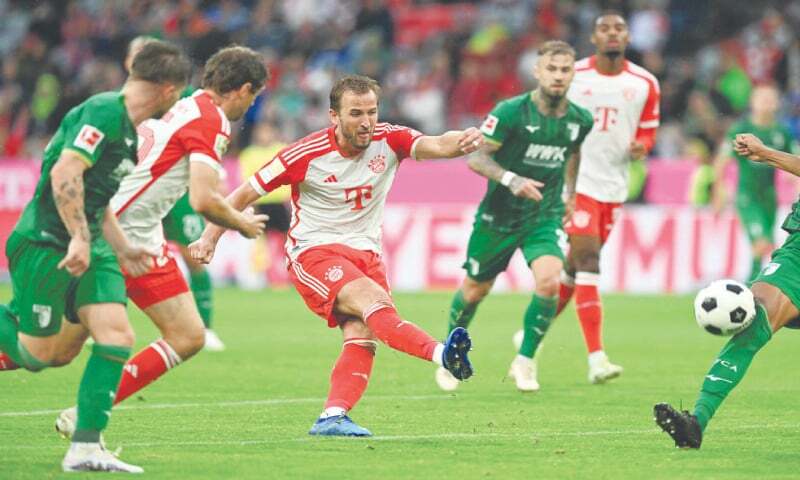 Kane scores twice on home debut as Bayern extend winning start ...