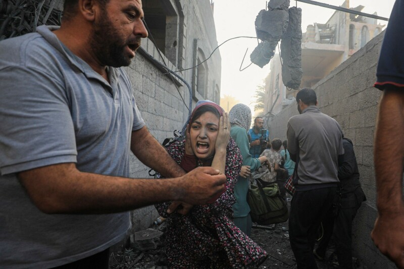 PHOTOS: Gazans flee after Israeli strikes on neighbourhood in Al ...