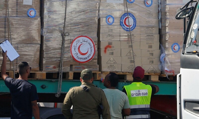 PHOTOS: Israel inspects humanitarian aid trucks headed for Gaza at ...