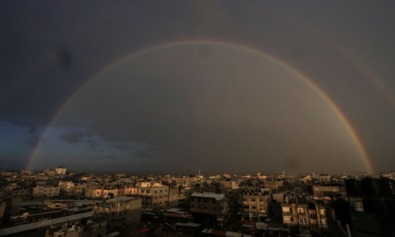 PHOTOS: Lightning illuminates smoke in Gaza night sky as rainbow ...
