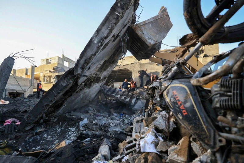 PHOTOS: Rescuers look for survivors in rubble after Israel strikes Gaza ...