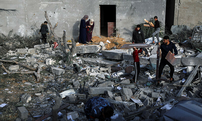 PHOTOS: Palestinians inspect damage at the site of Israeli strikes in ...