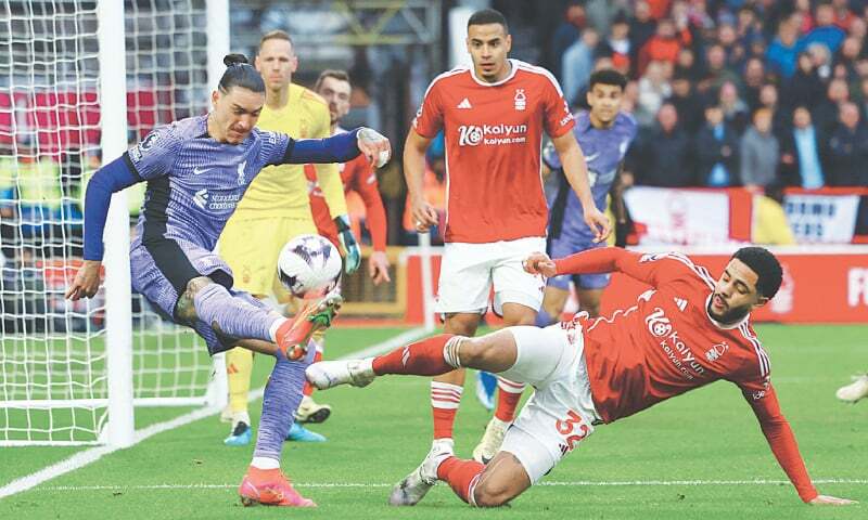 Liverpool strike late to beat Forest, Spurs fight back to close on top ...