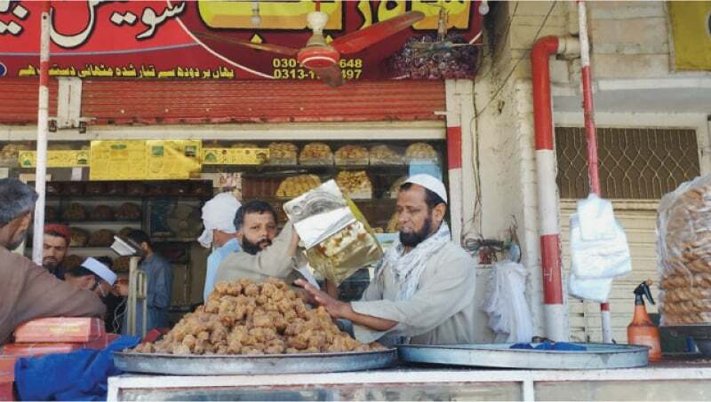 Traditional Rajjar Mithai attracts customers in Charsadda - Newspaper ...