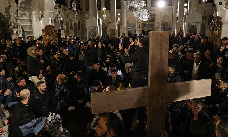 Hundreds protest in Syrian capital after Christmas tree burned - World ...